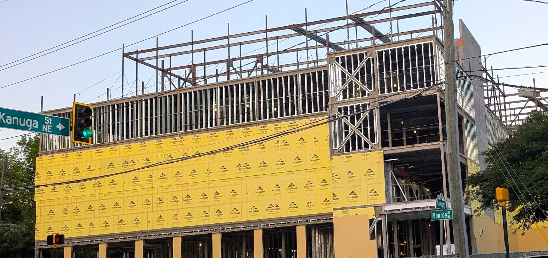 Self-storage project overlooking Atlanta's marquee park tops out ...